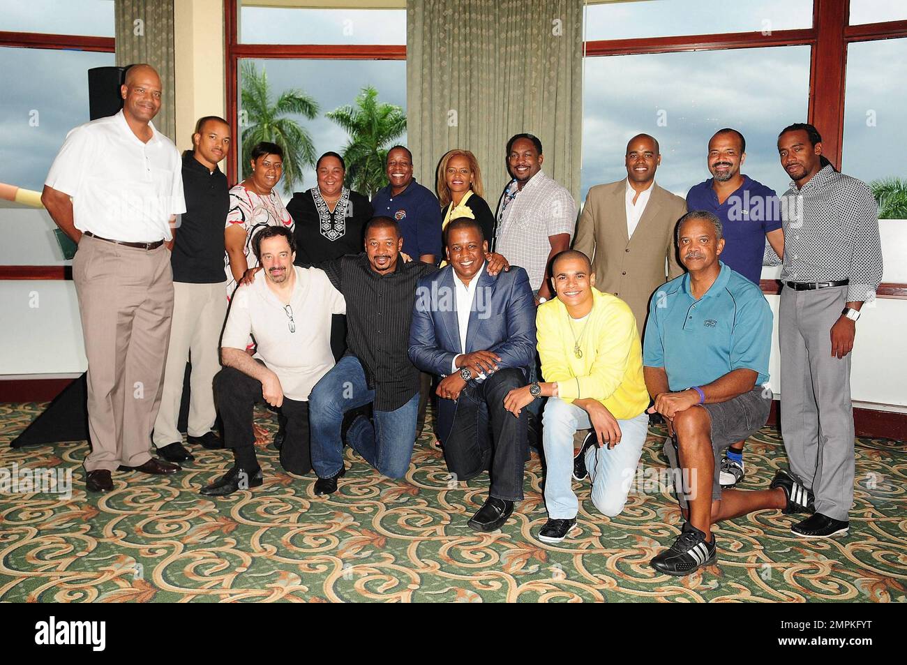(Top L-R) Paul McRae, E.V.P. and C.F.O. of BET Netwok Michael Pickrum ...