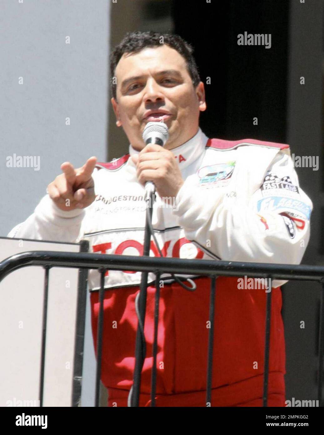 Carlos Mencia takes part in the post-race intervies following the Long ...