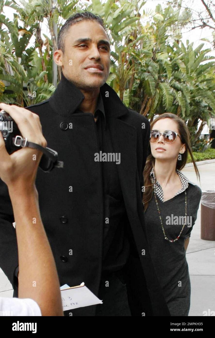 Rick Fox and girlfriend Eliza Dushku arrive at the Staples Center to ...