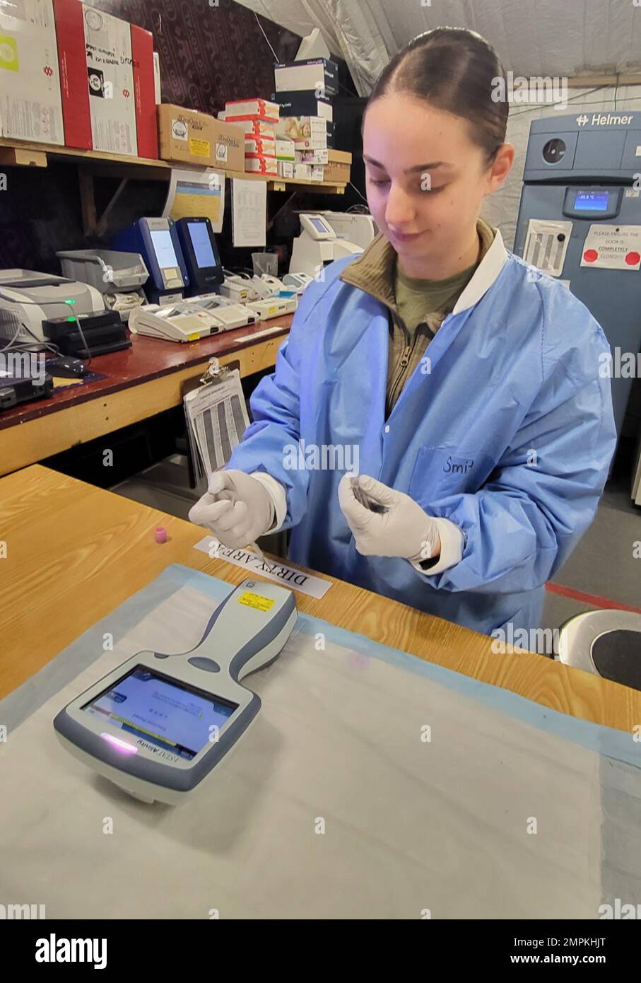 OIR CJTF MED 374 Sgt. Samantha Smith, LAB NCO, prepares a TBI plasma ...