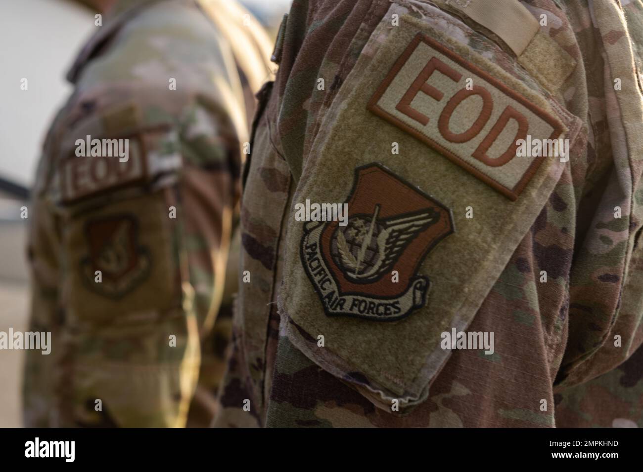 Explosive ordnance disposal (EOD) technicians stand by for instruction ...