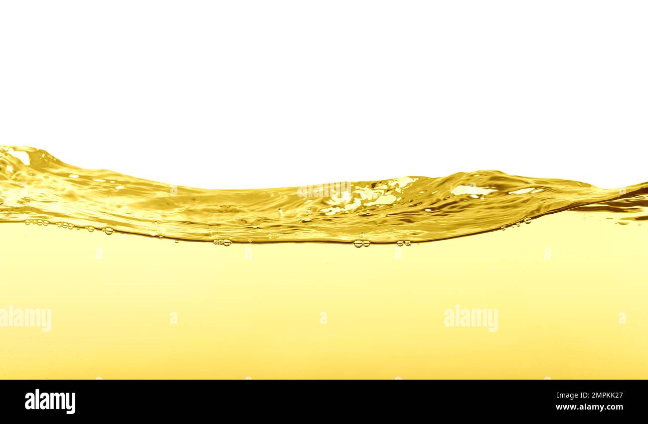 Flow of natural cooking oil on white background Stock Photo - Alamy