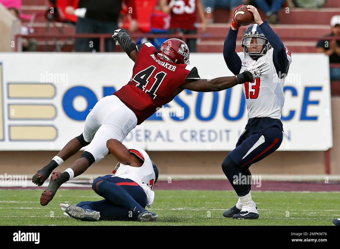 New Mexico State linebacker Leon McQuaker (41) jumps over South Alabama ...