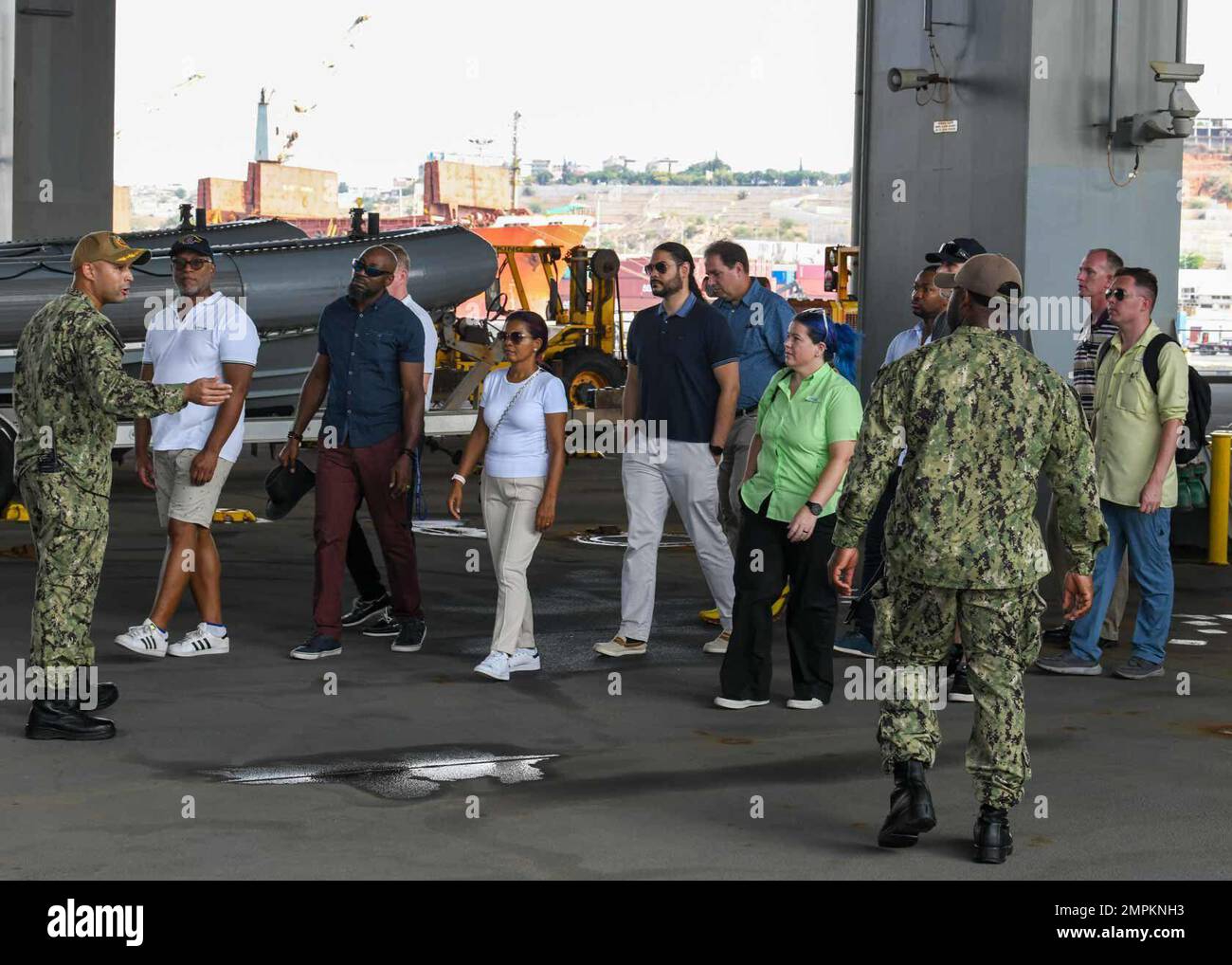 LUANDA, Angola (Nov. 2, 2022) Cdr. Calvin Beads, left, executive officer for the expeditionary ...