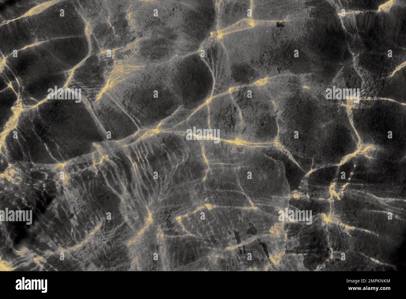 Abstract photo of a moving water surface glow. The background is ...