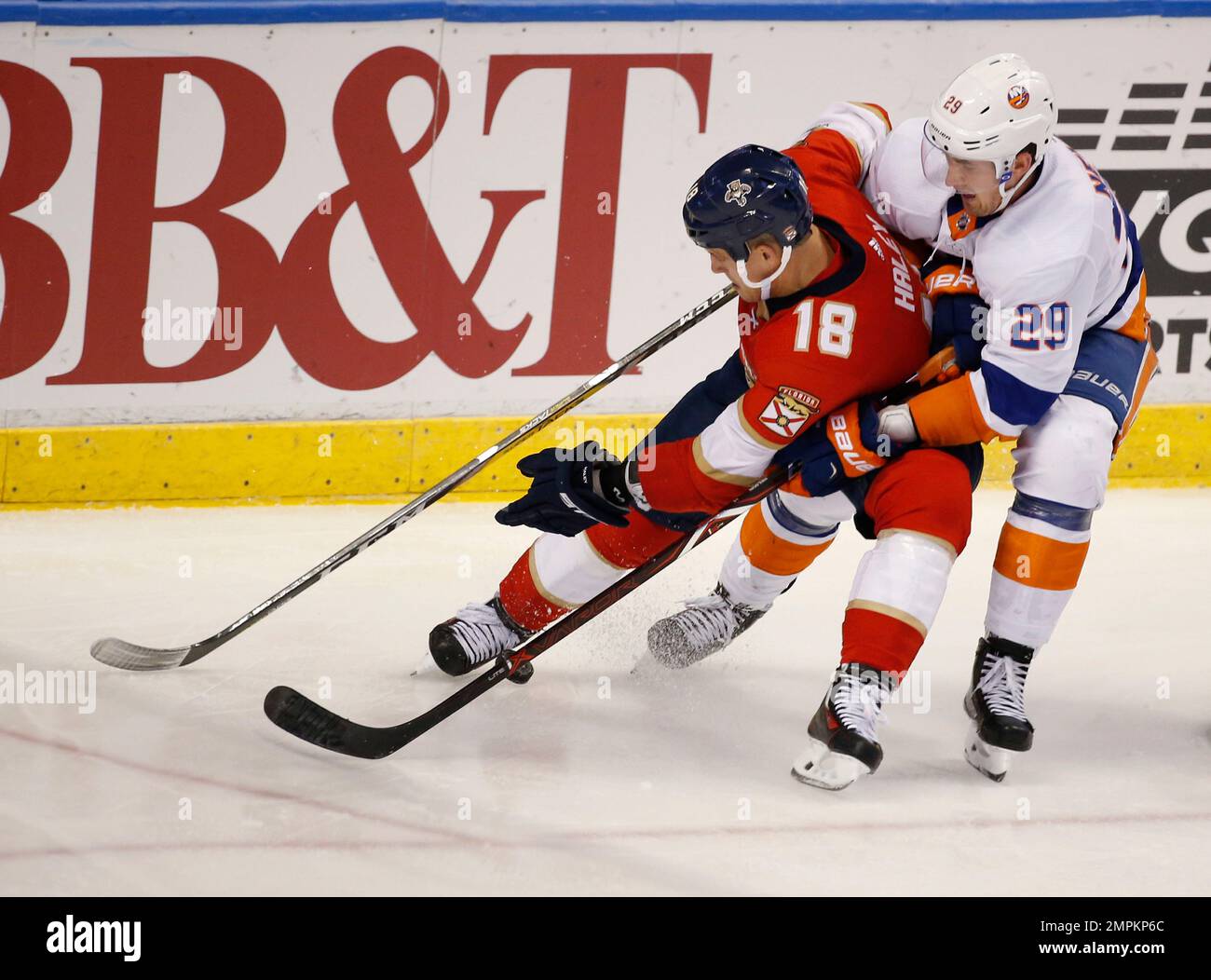 Florida Panthers center Micheal Haley (18) and New York Islanders ...