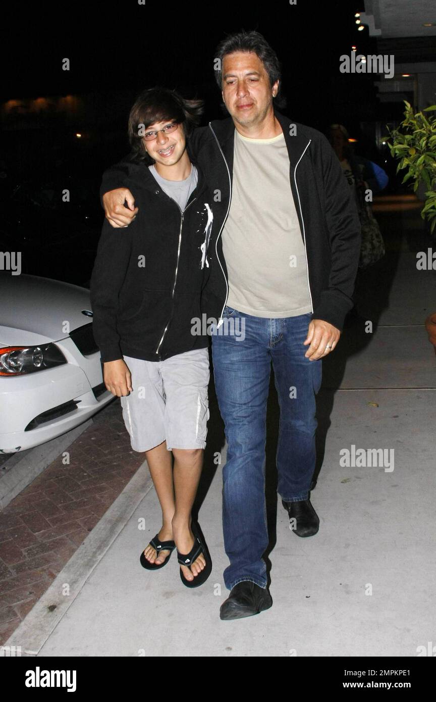 Actor Ray Romano goofs around with his son Joseph as they arrive at ...