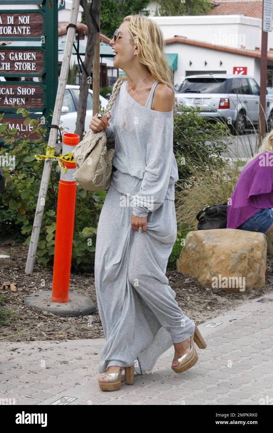 Celebrity stylist Rachel Zoe is all smiles as she makes her way through ...