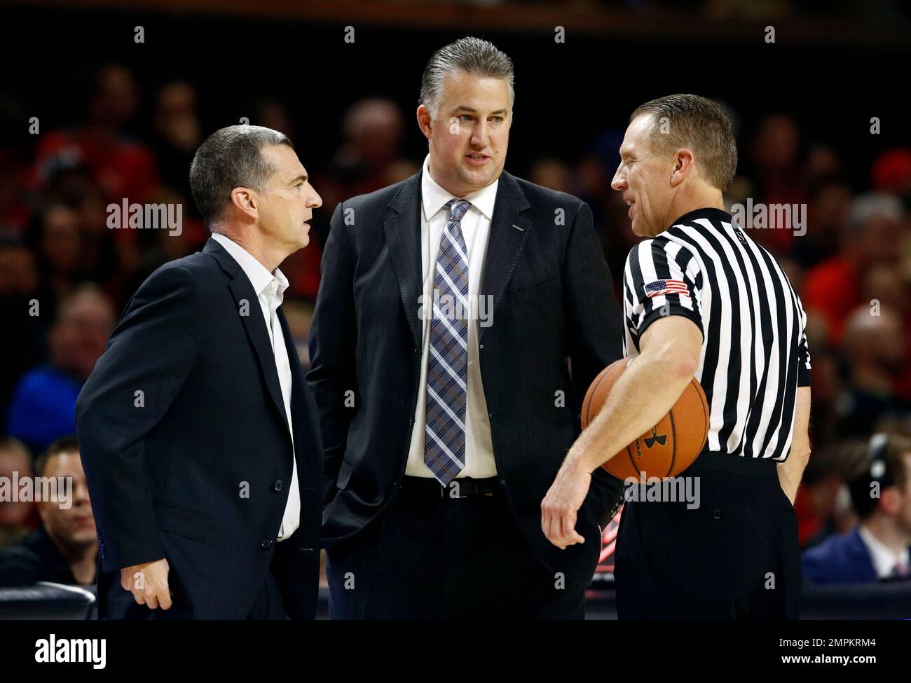 Maryland head coach Mark Turgeon, left, and Purdue head coach Matt ...