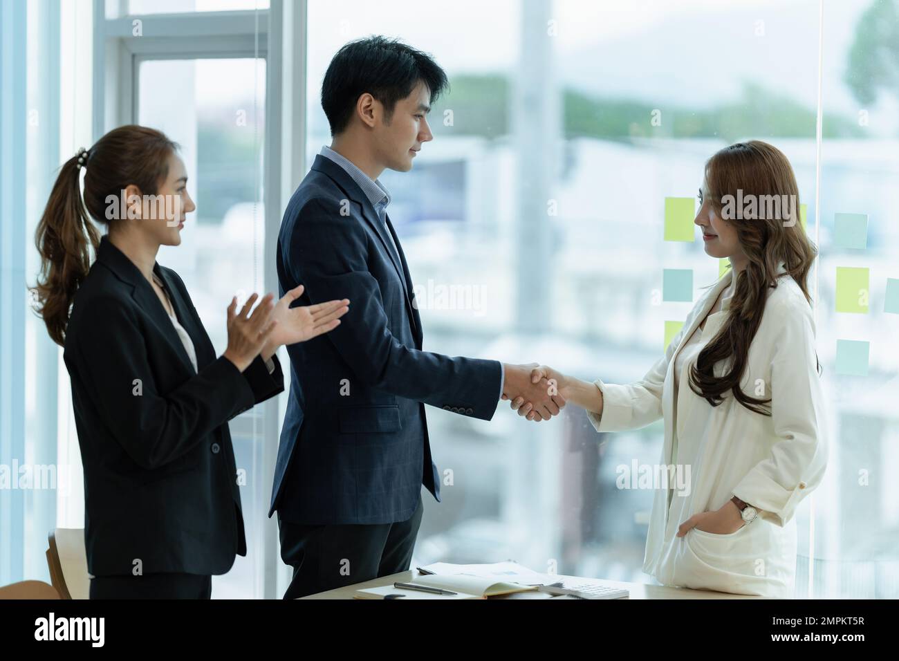 Business people successful negotiation and handshake. celebration ...