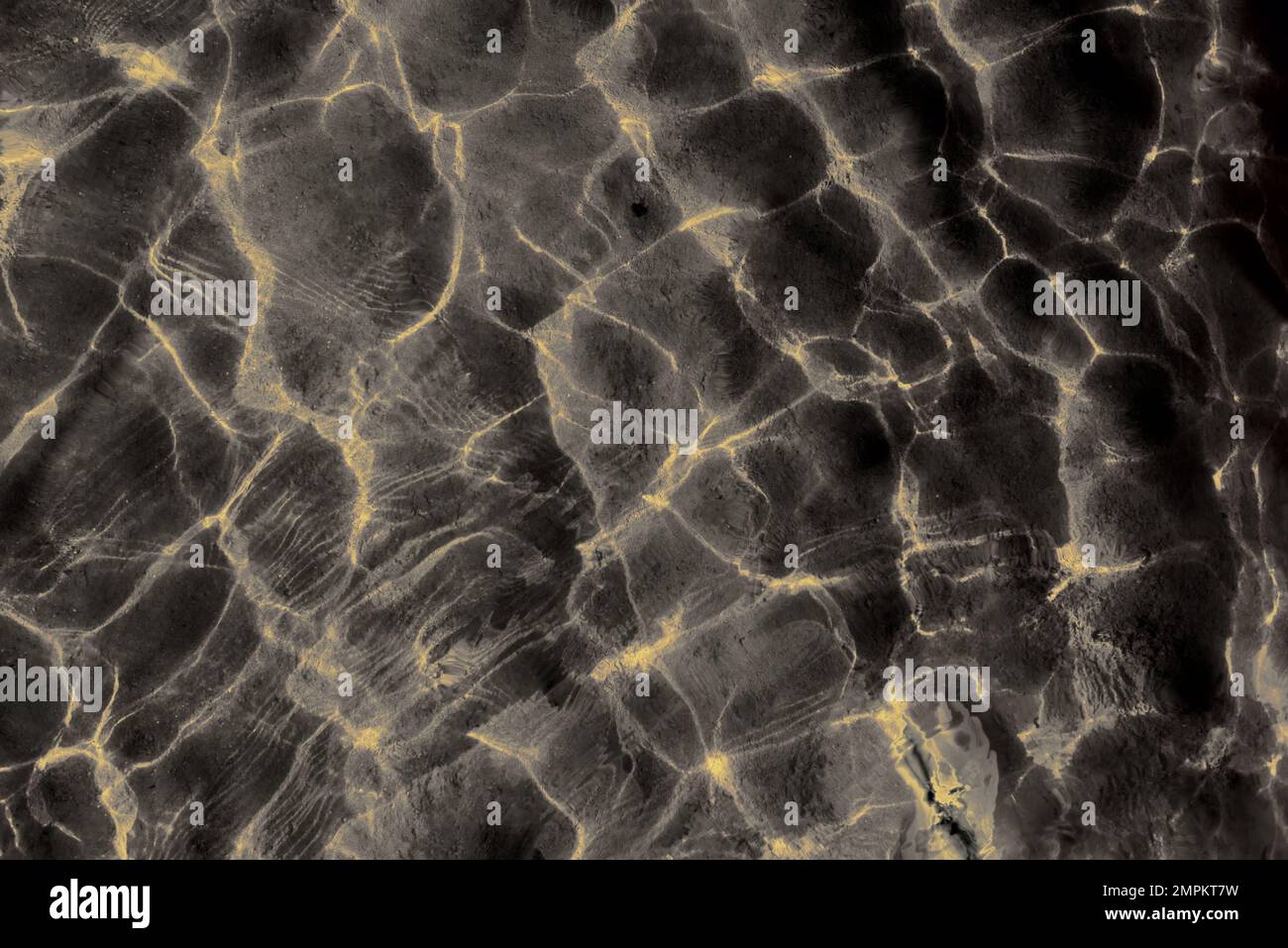 Abstract photo of the glow of the surface of transparent water ...