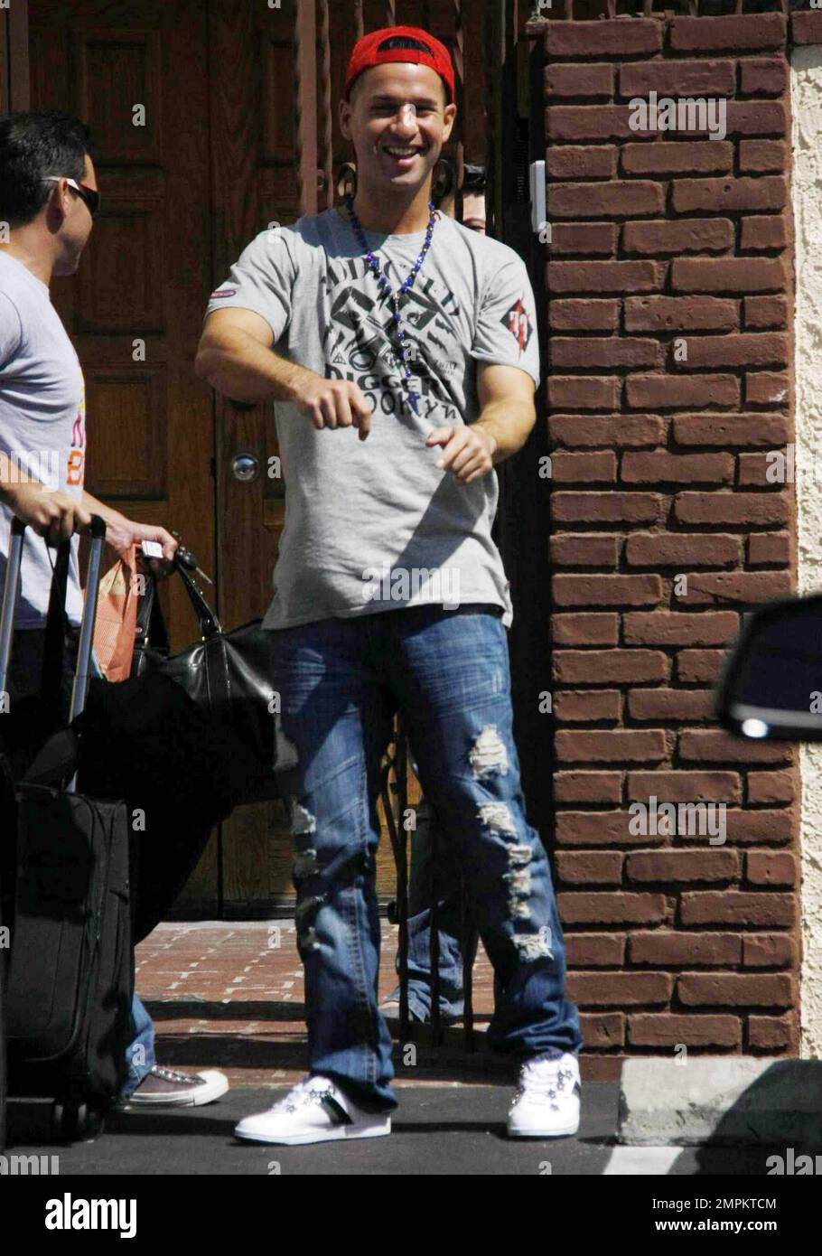 Mike 'The Situation' Sorrentino manages to keep his shirt down as he ...