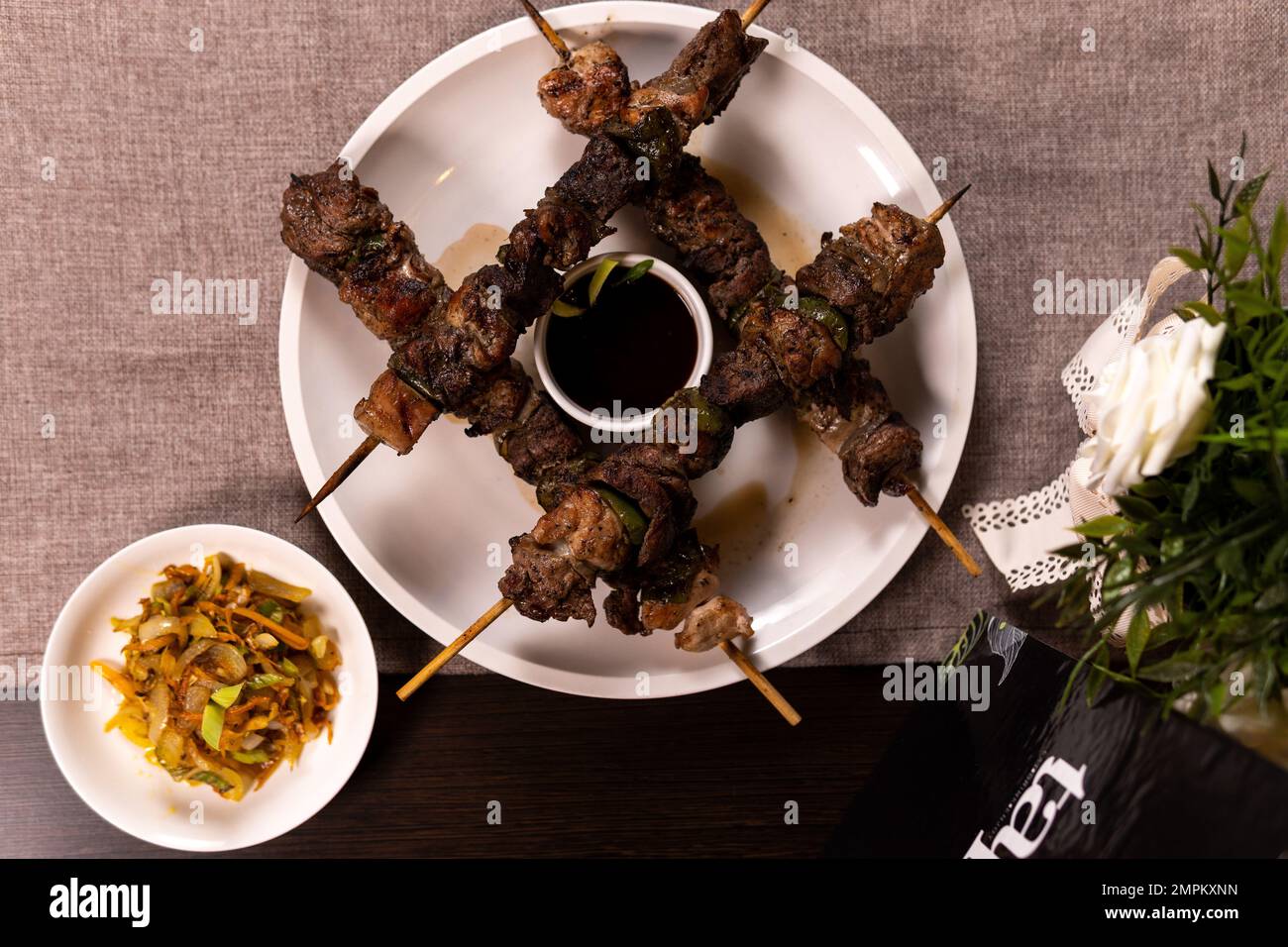 dishes of different foods served in an elegant and striking way inside ...