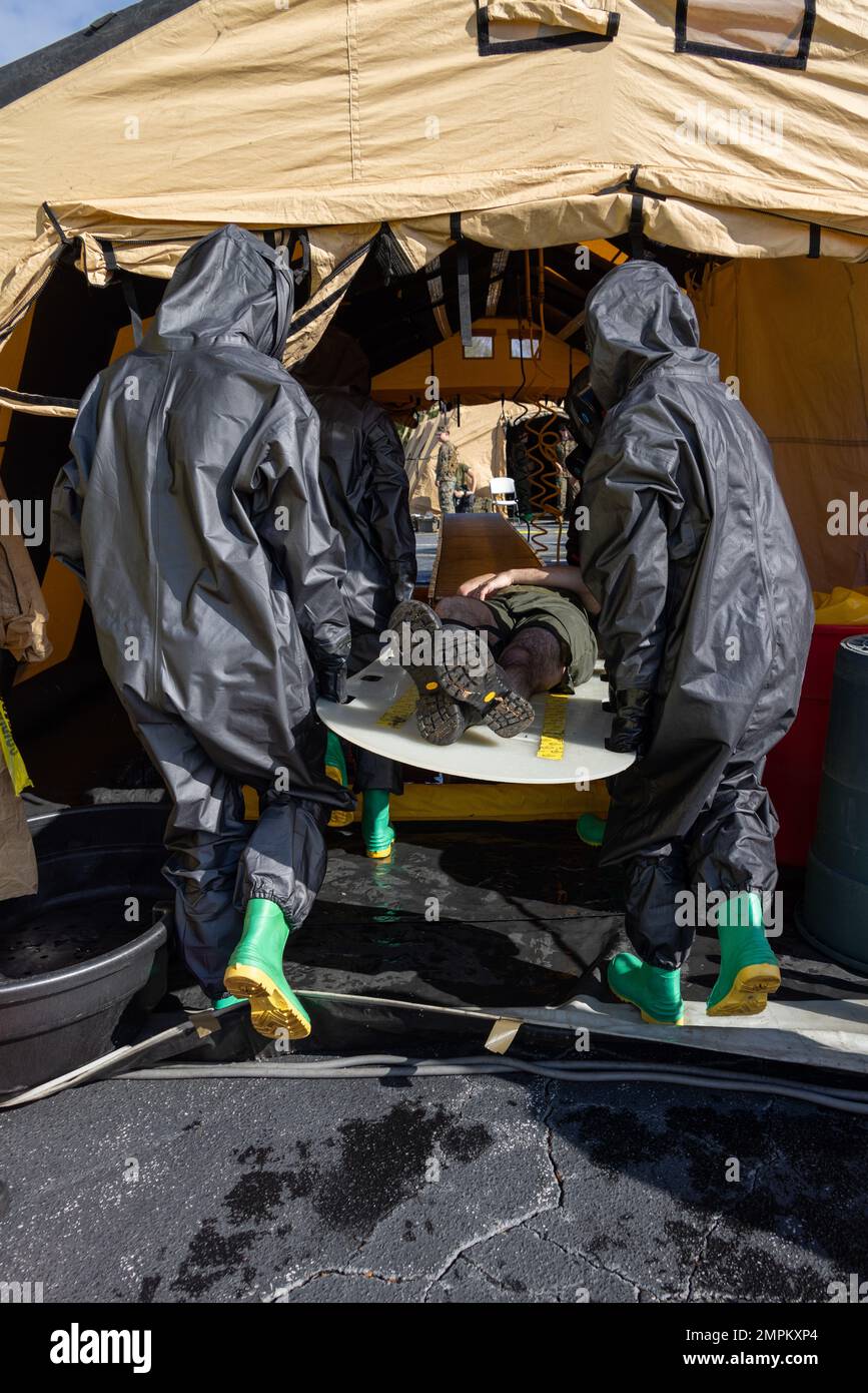 U.S. Marines with Chemical Biological Incident Response Force carry a ...