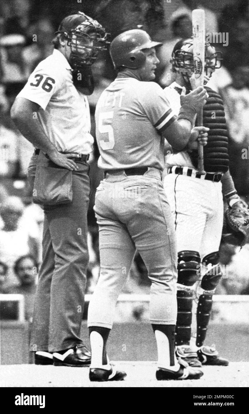Home plate umpire Tim McClelland, left, keeps an eye on Kansas City's ...