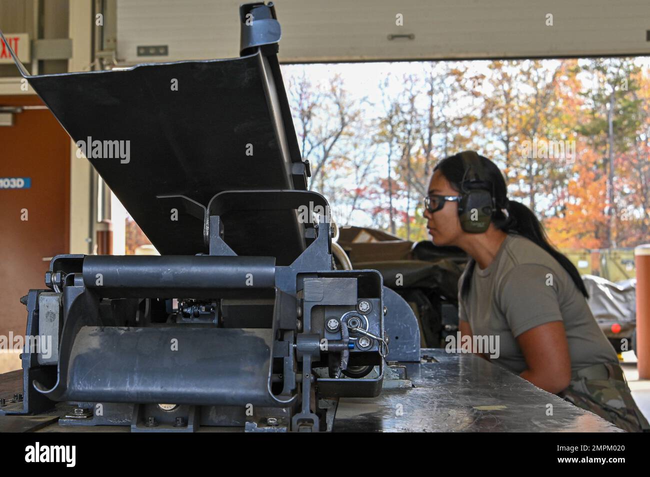 U.S. Air National Guard Staff Sgt. Fiona Romero downloads 20 millimeter ...