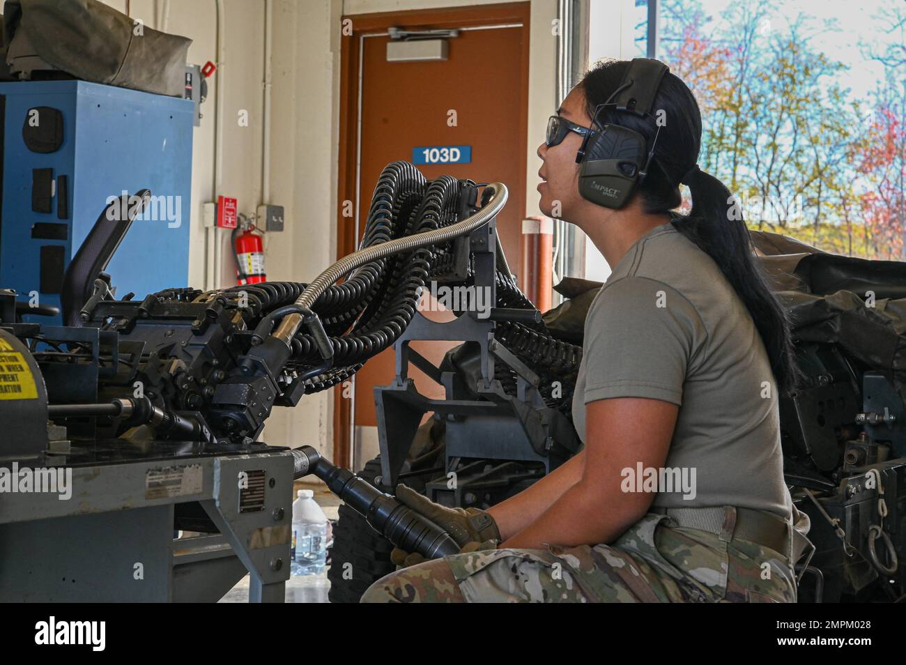 U.S. Air National Guard Staff Sgt. Fiona Romero downloads 20 millimeter ...