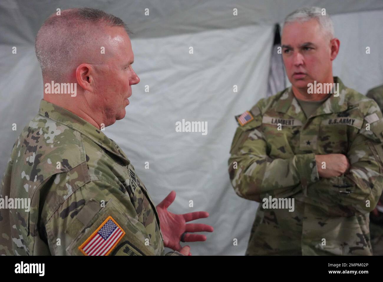 Col. Greg St. Romain (left), commander of the Louisiana National Guard's 225th Engineer Brigade ...