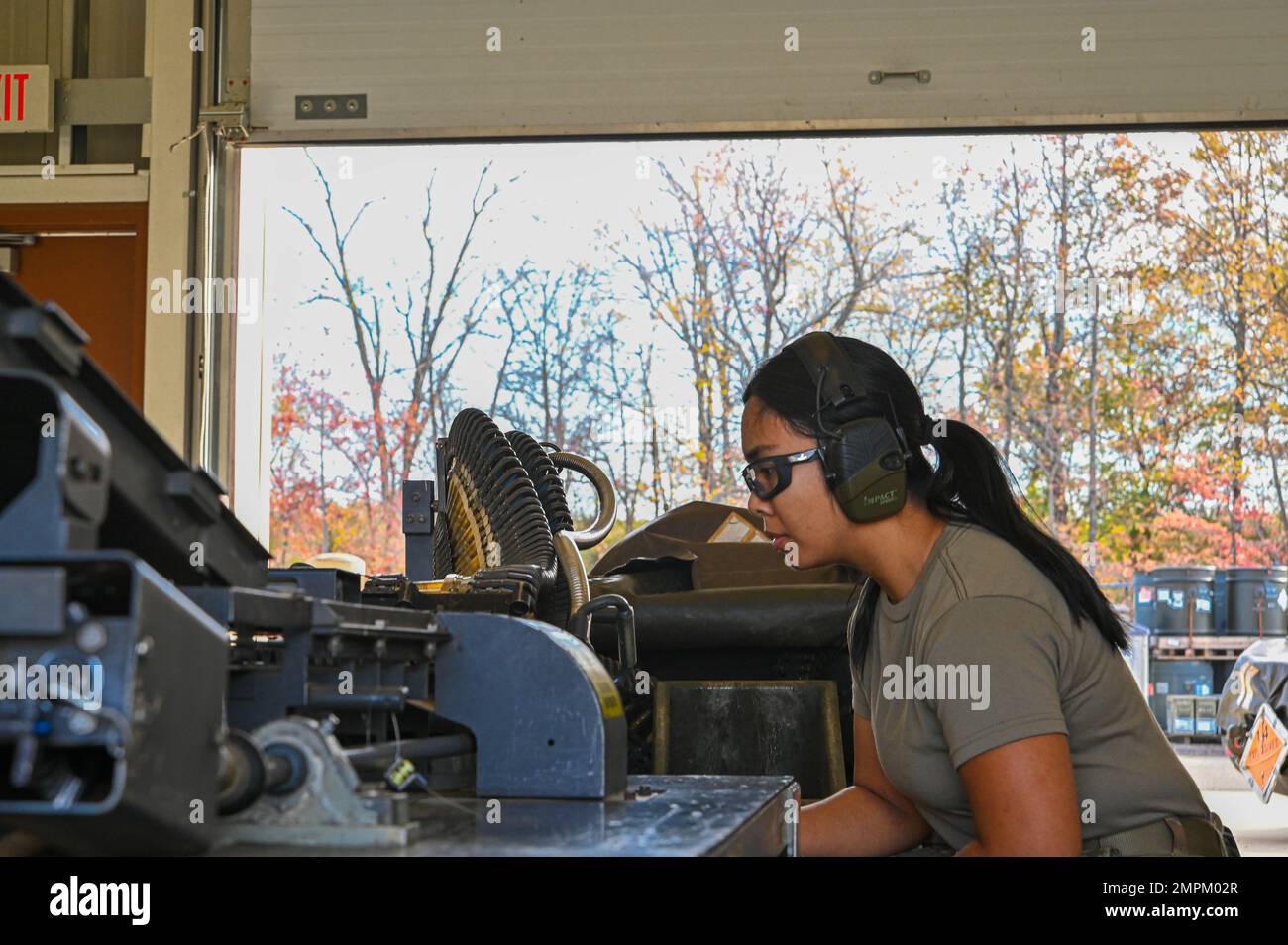 U.S. Air National Guard Staff Sgt. Fiona Romero downloads 20 millimeter ...