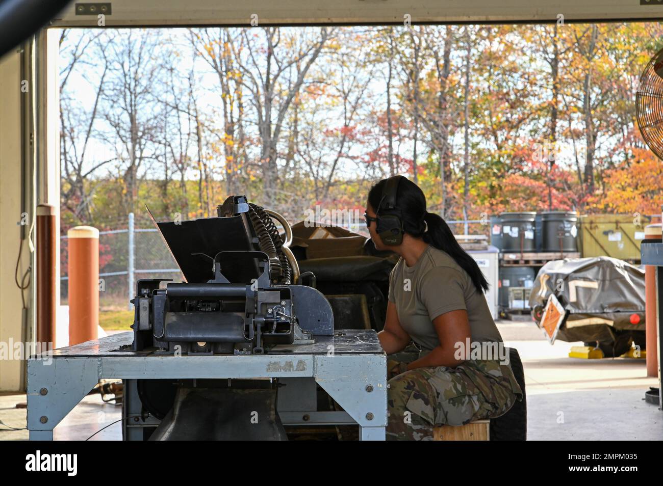 U.S. Air National Guard Staff Sgt. Fiona Romero downloads 20 millimeter ...