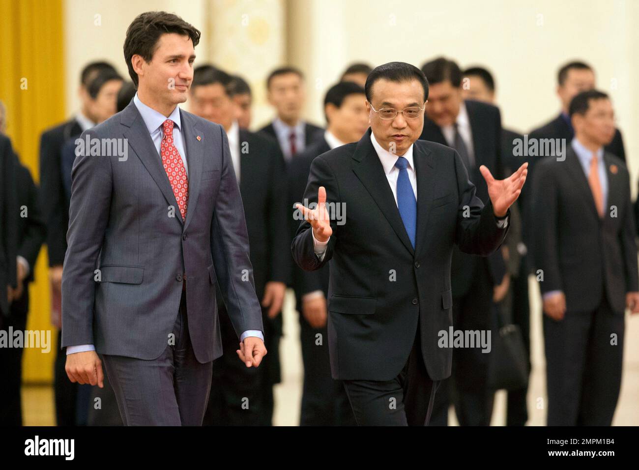 Canadian Prime Minister Justin Trudeau, left, chats with Chinese ...