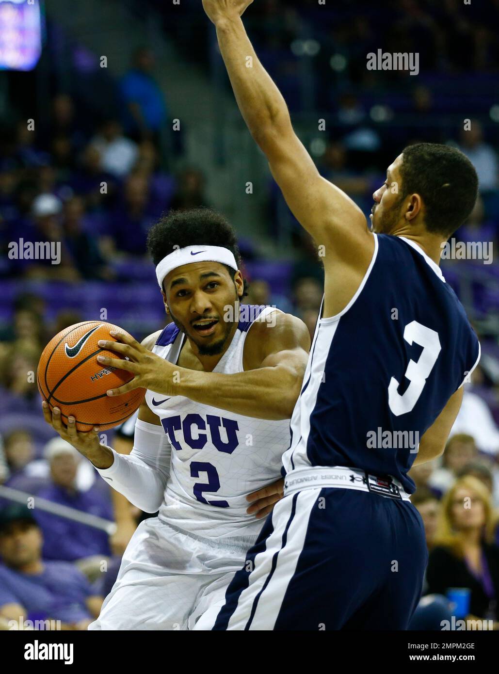 TCU guard Shawn Diden (2) drives past Yale guard Alex Copeland (3) in ...
