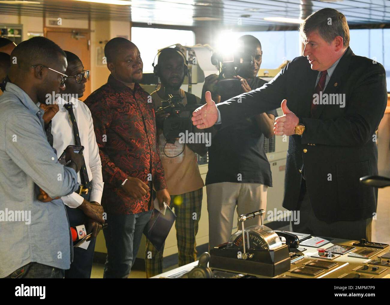 LUANDA, Angola (Nov. 3, 2022) Mr. Joseph Darlak, right, ship’s master for the expeditionary sea ...