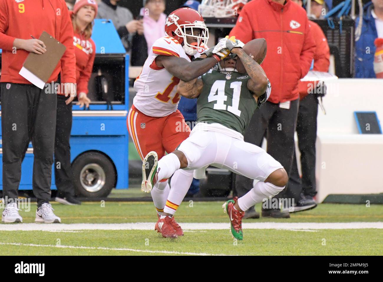 New York Jets' Buster Skrine, right, breaks up a pass intended for ...