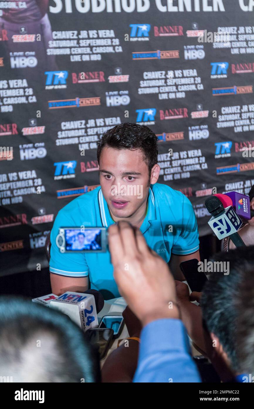 Pro boxer Julio Cesar Chavez Jr (46-1-1, 32 KOs) (left) and Pro boxer ...