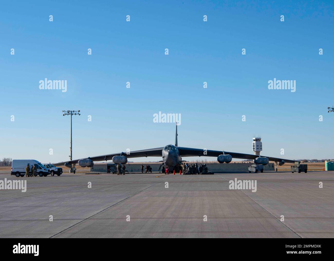 Team Minot Airmen load weapons into a B-52H Stratofortress, during ...