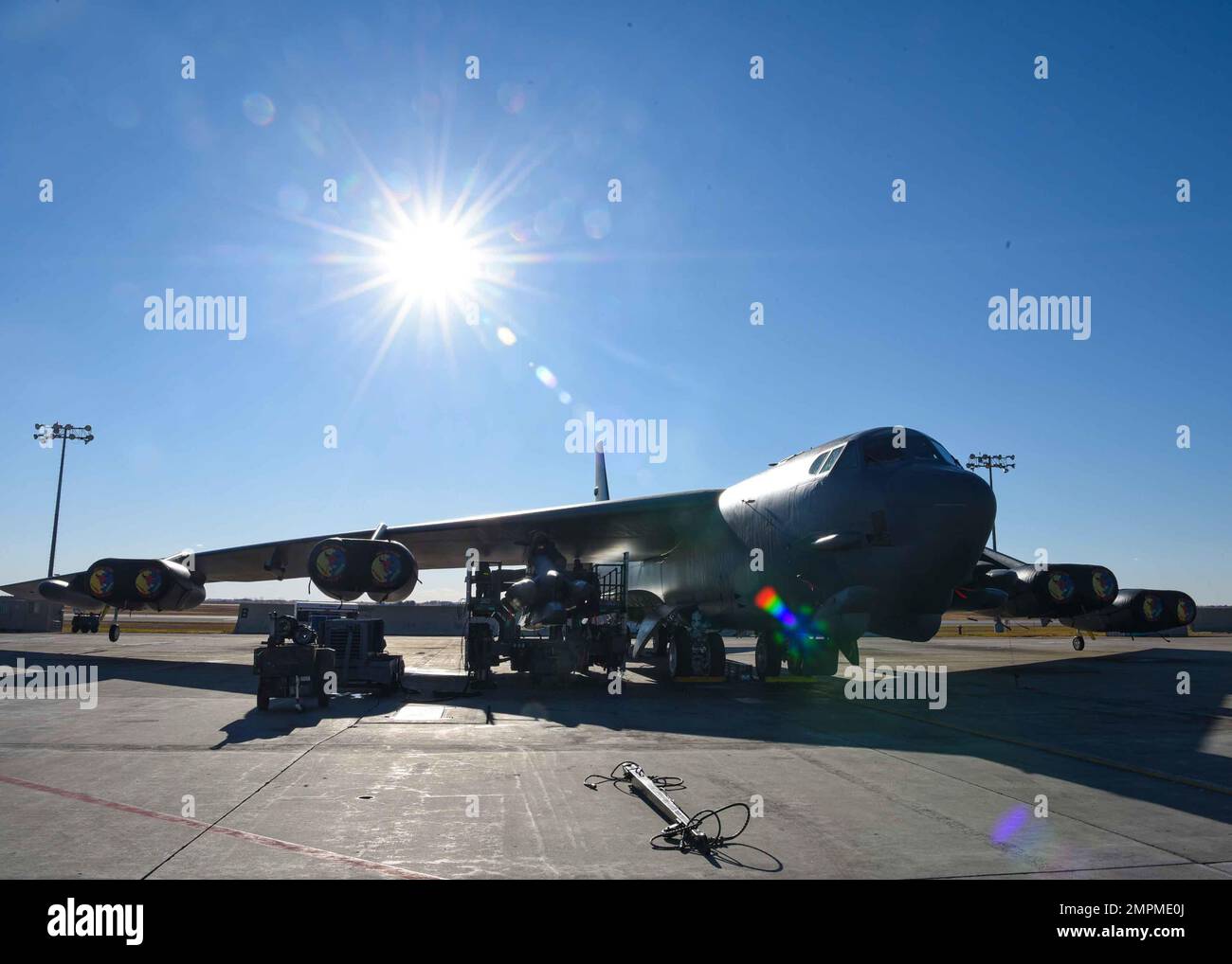 Team Minot Airmen load weapons into a B-52H Stratofortress during ...