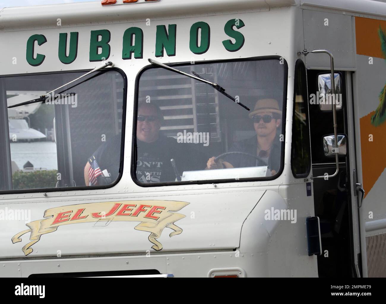 Sofia Vergara practices her lines with costars Jon Favreau and Emjay Anthony while fellow actor ...