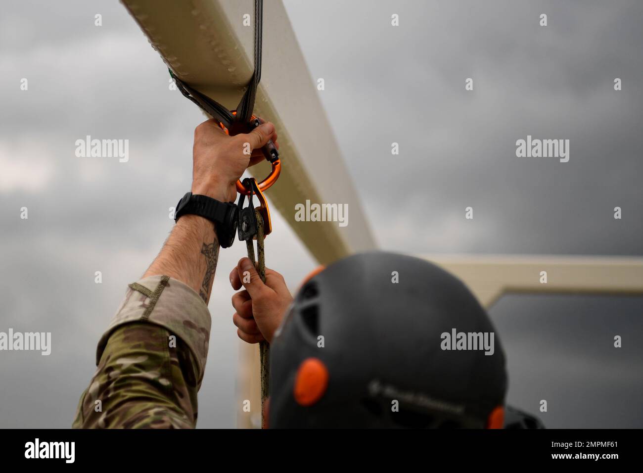 A pararescueman assigned to the 57th Rescue Squadron sets a high point ...