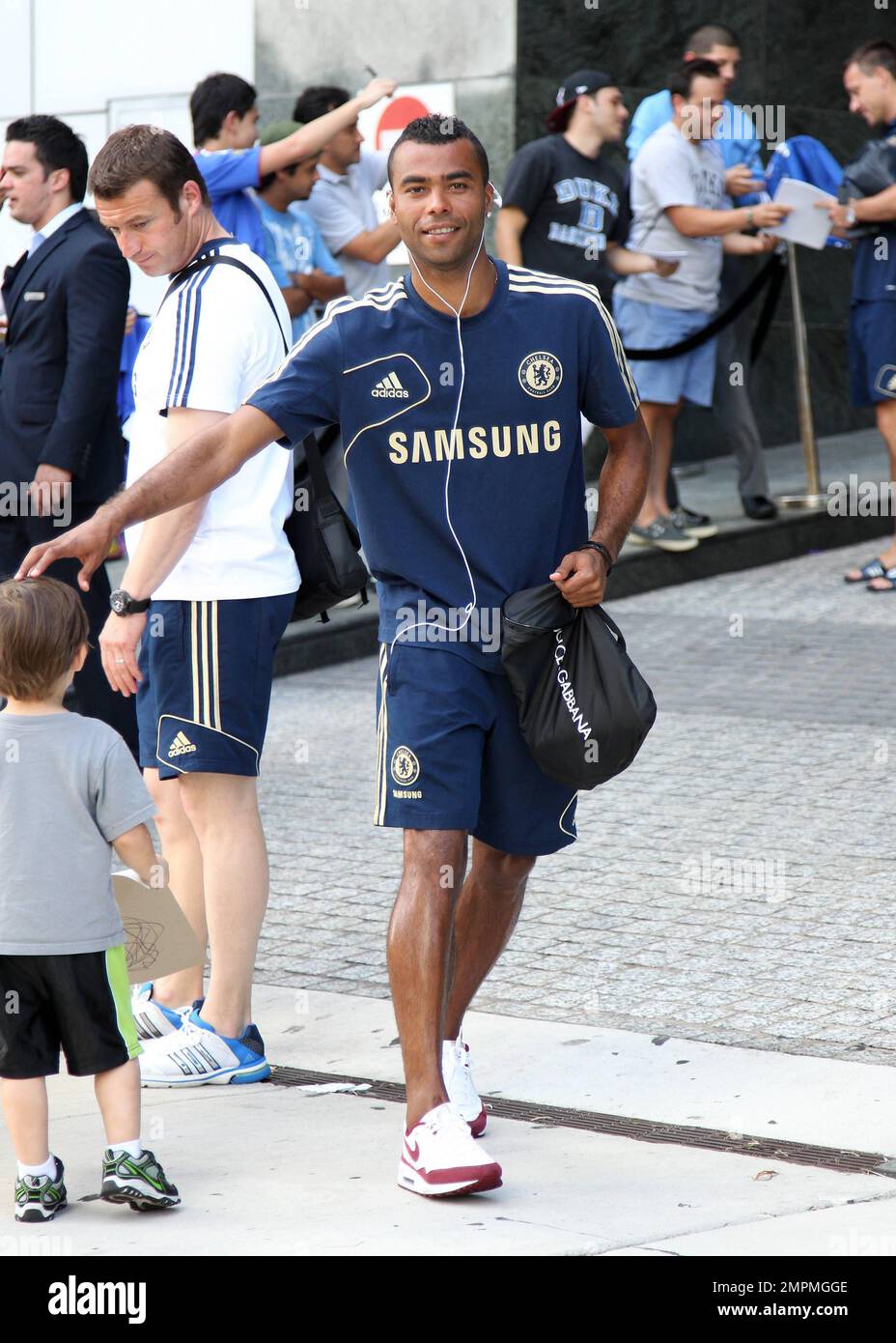 EXCLUSIVE!! Chelsea left back Ashley Cole poses for photos and signs ...