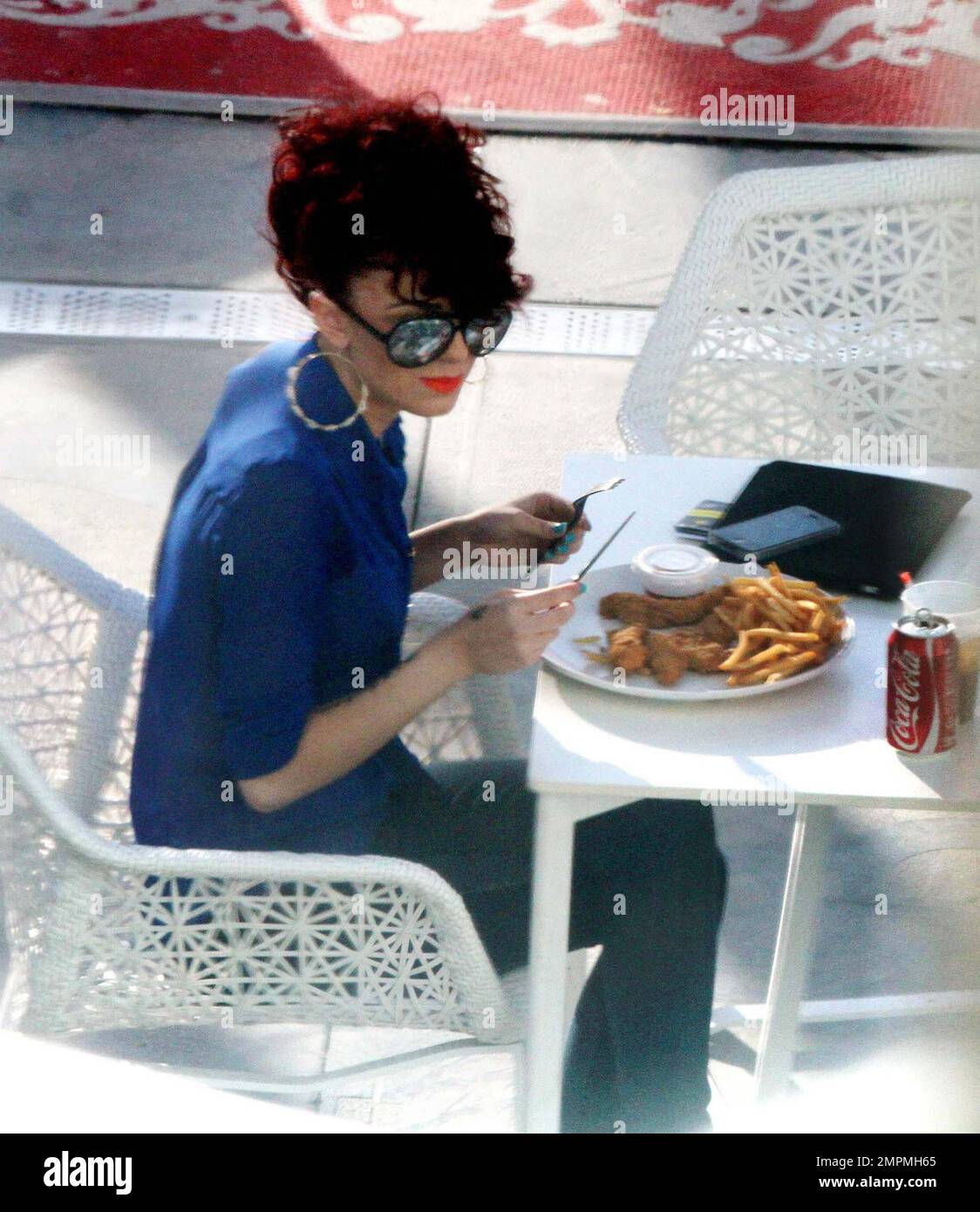 EXCLUSIVE!! UK "X-Factor" star Cher Lloyd enjoyed an early poolside ...