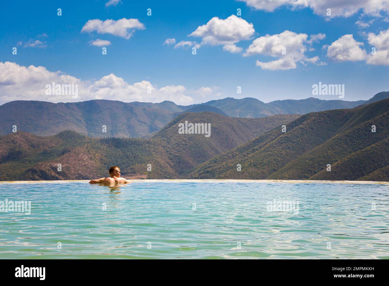 Beautiful landscape of natural infinity pool Hierve el Agua with young ...