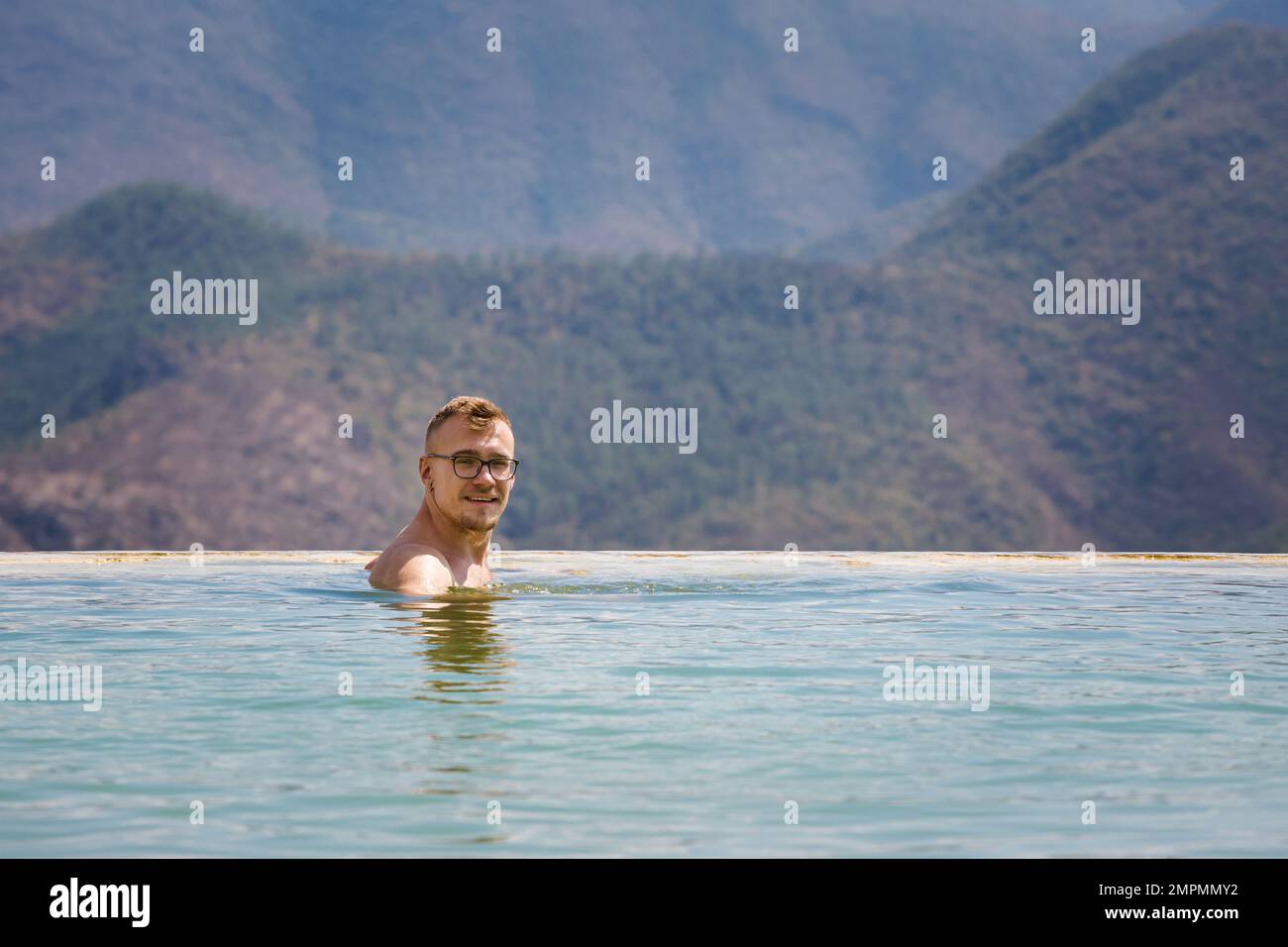 Beautiful landscape of natural infinity pool Hierve el Agua with young ...