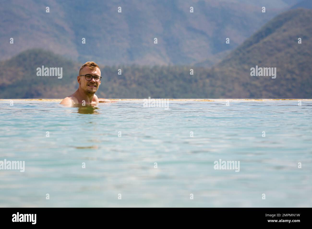 Beautiful landscape of natural infinity pool Hierve el Agua with young ...