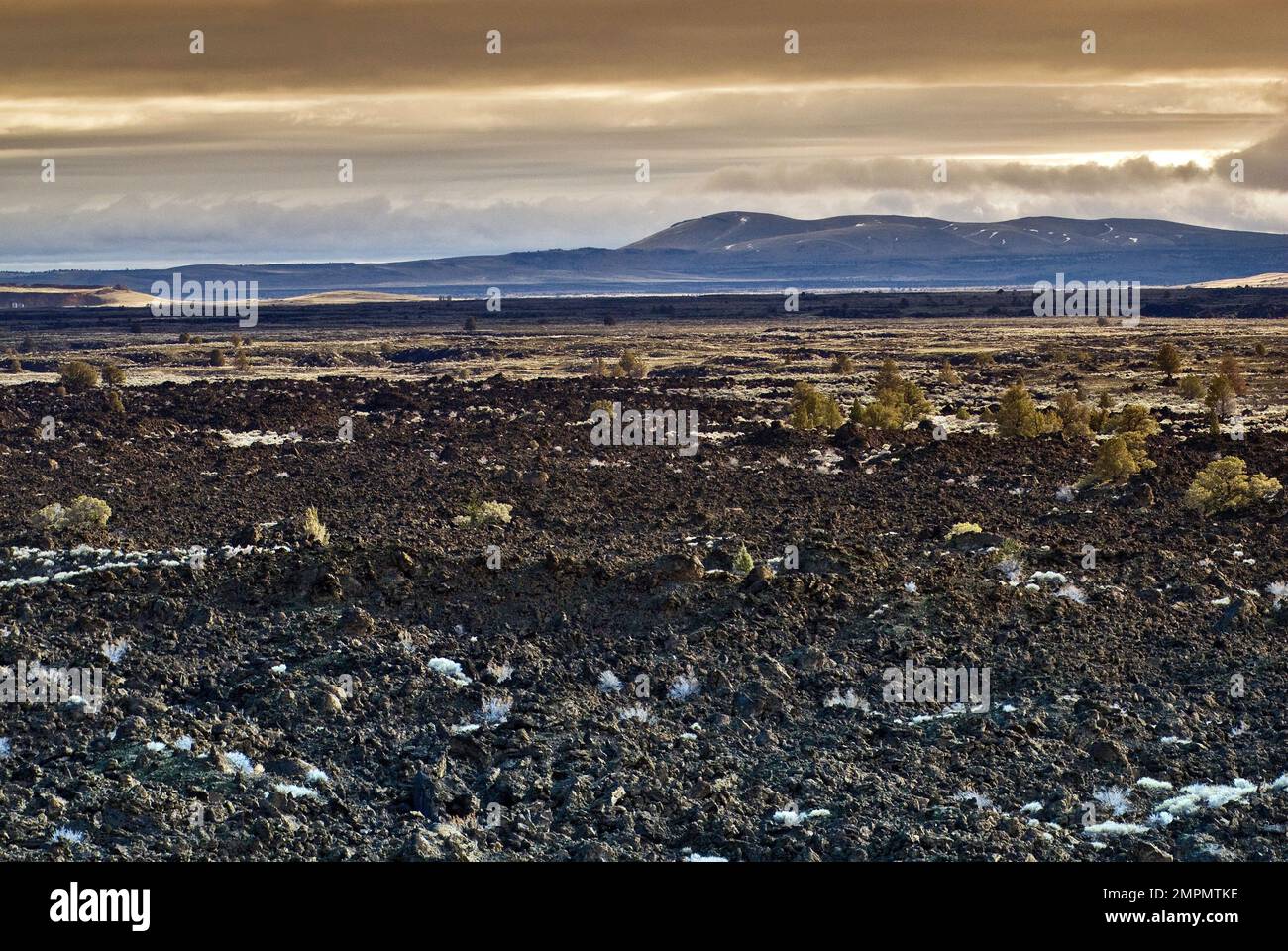 Devils Homestead Flow, Cascade Range in distance, at Lava Beds National ...