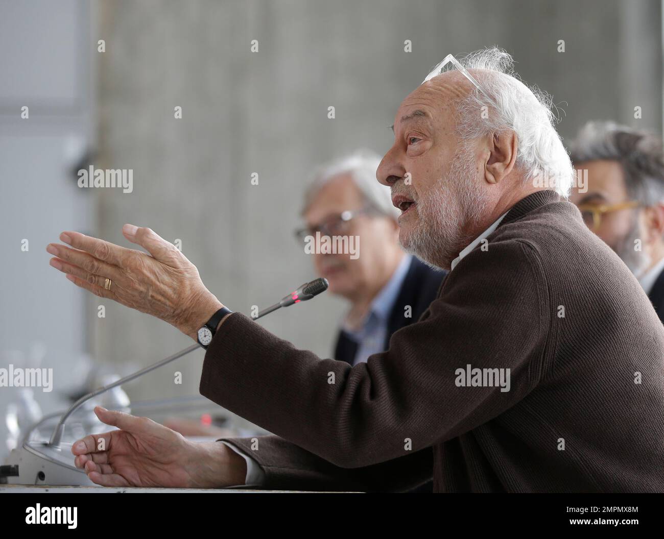 Designer Gaetano Pesce gestures as he attends a presentation of the ...