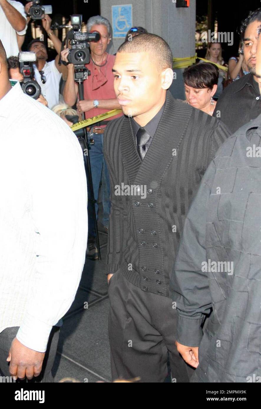 A subdued Chris Brown pleaded not guilty today to felony charges during ...