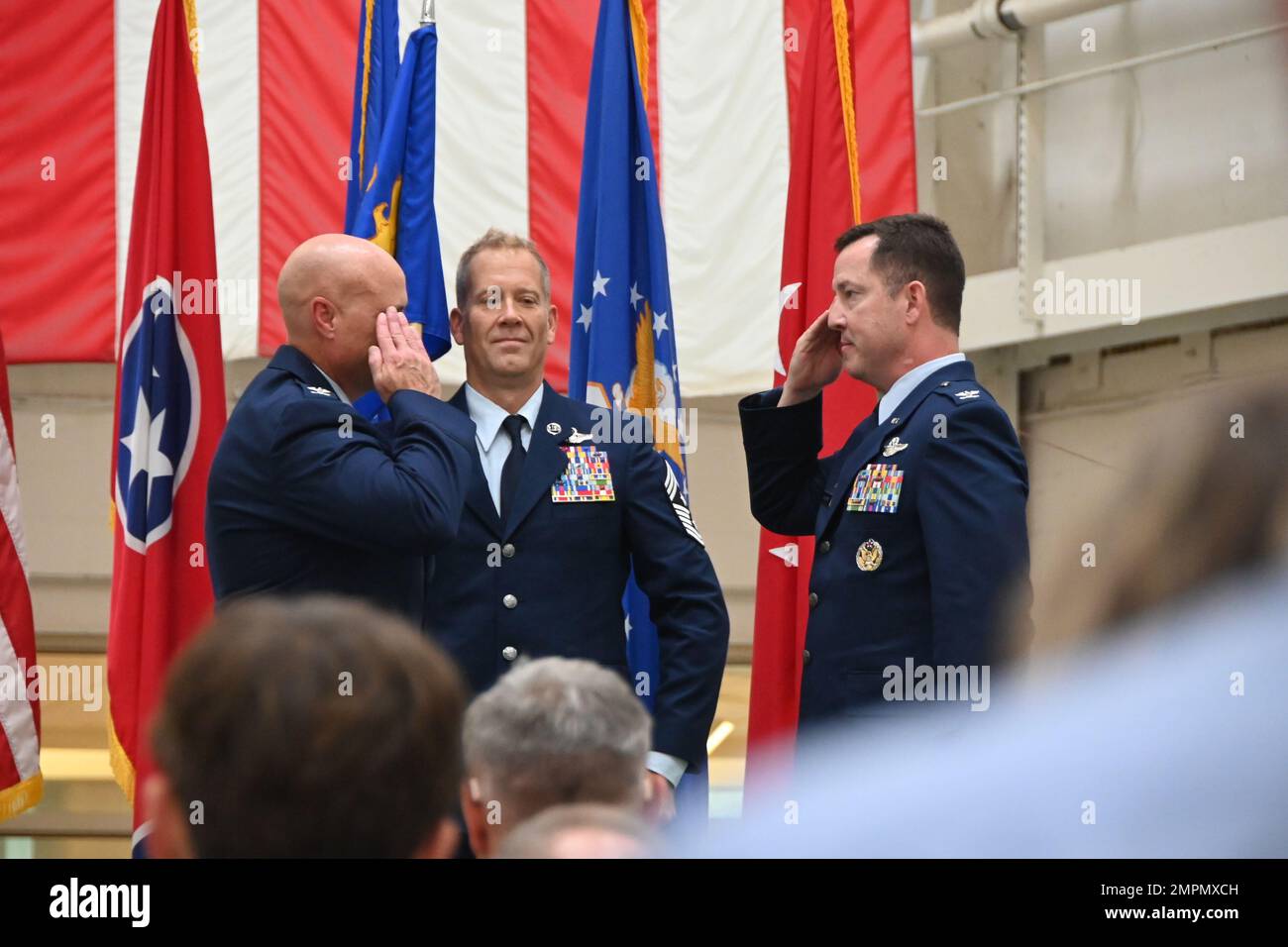 Col. Ted Geasley, incoming commander of the 118th Wing, salutes Col ...