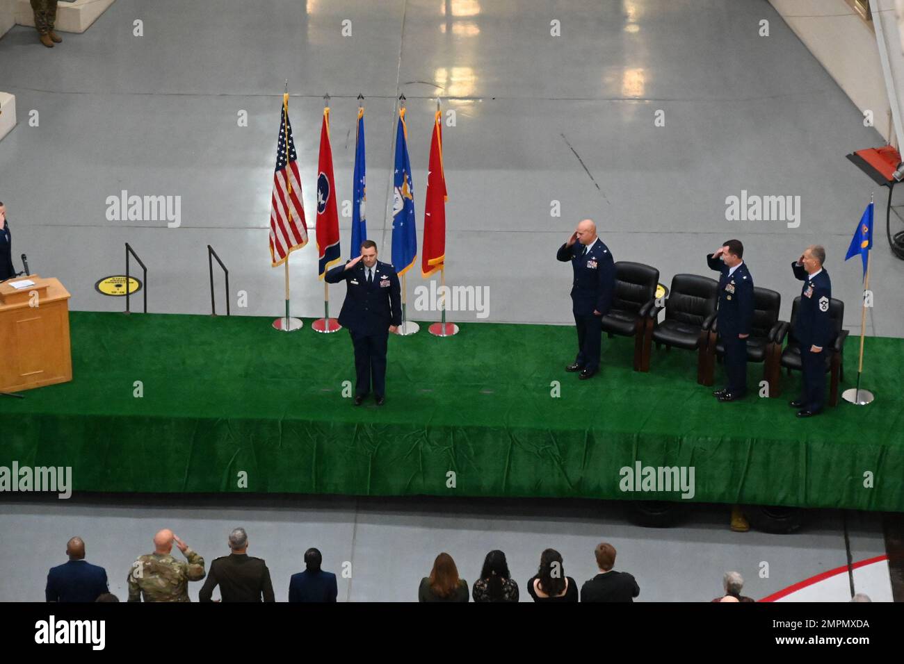 Col. Todd Wiles, outgoing commander of the 118th Wing, salutes the wing ...