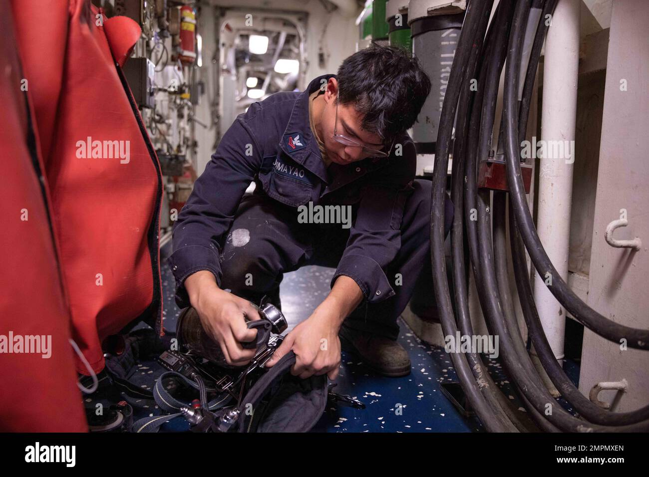 Damage Controlman 2nd Class Bernardanrew Jumayo, assigned to the ...