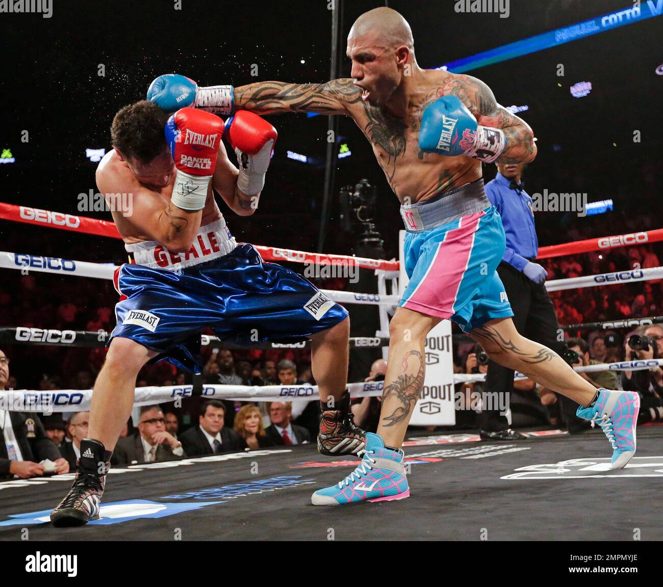 FILE - In this June 6, 2015, file photo, Miguel Cotto, right, of Puerto ...