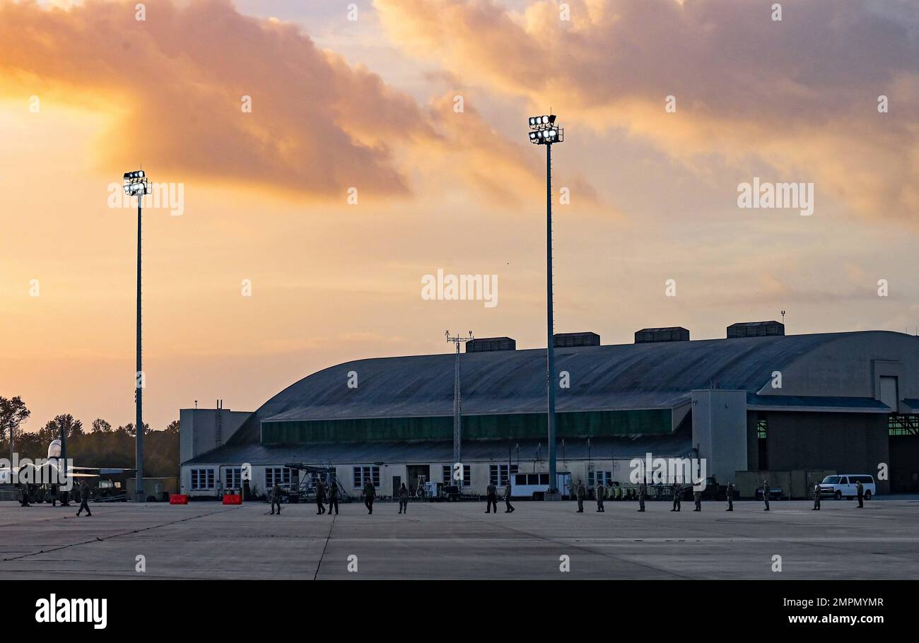 Multiple Airmen conduct a foreign object debris (FOD) walk prior to the ...