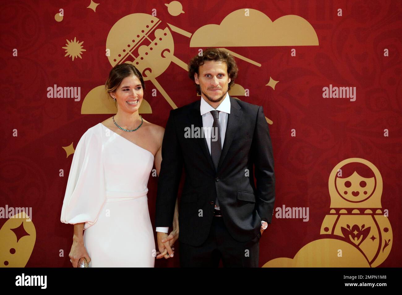 Uruguayan former soccer player Diego Forland and his wife Paz Cardoso ...
