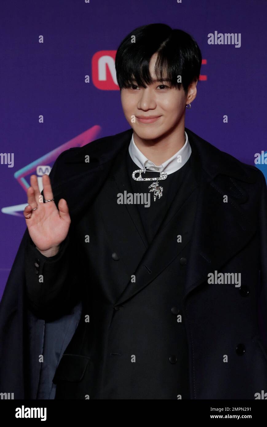 South Korean singer-actor Taemin poses for photos on the red carpet of ...