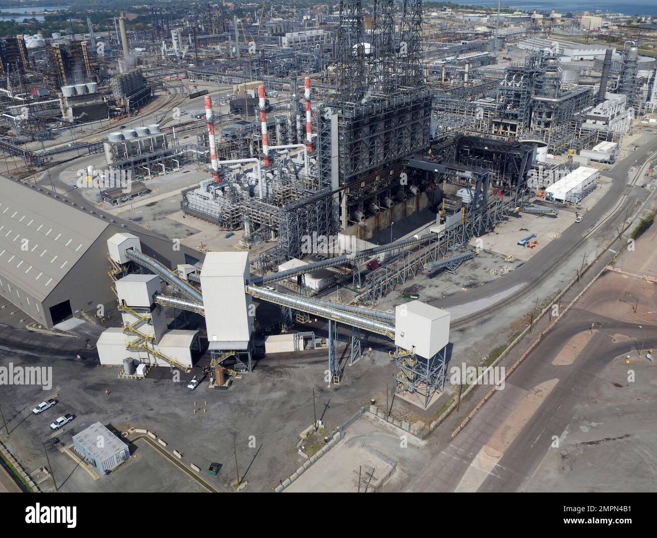 In this Sept. 21, 2017 photo, petroleum coke, the grainy black ...