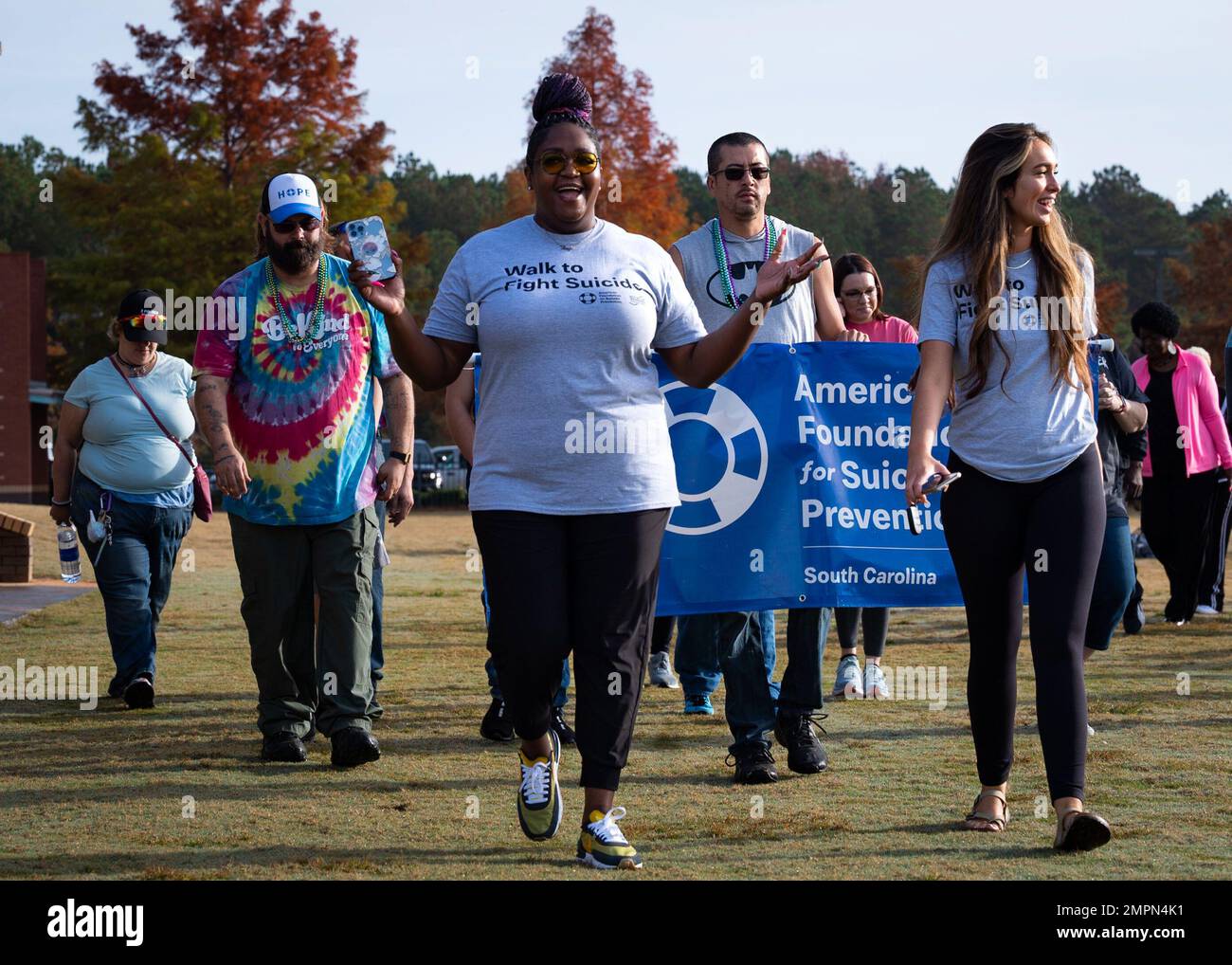 Volunteers Shavan Fulton (left) and Brooke Braswell (right) lead the ...
